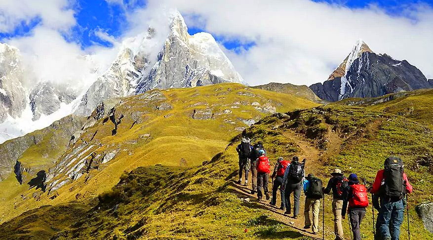 Hiking up a mountain - Town of Traveller